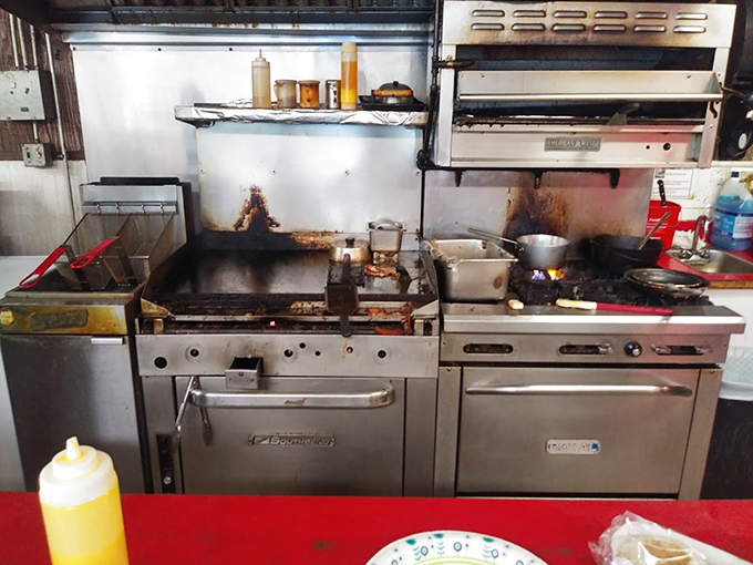Where the magic happens! This bustling kitchen is like a well-oiled machine, churning out comfort food classics.