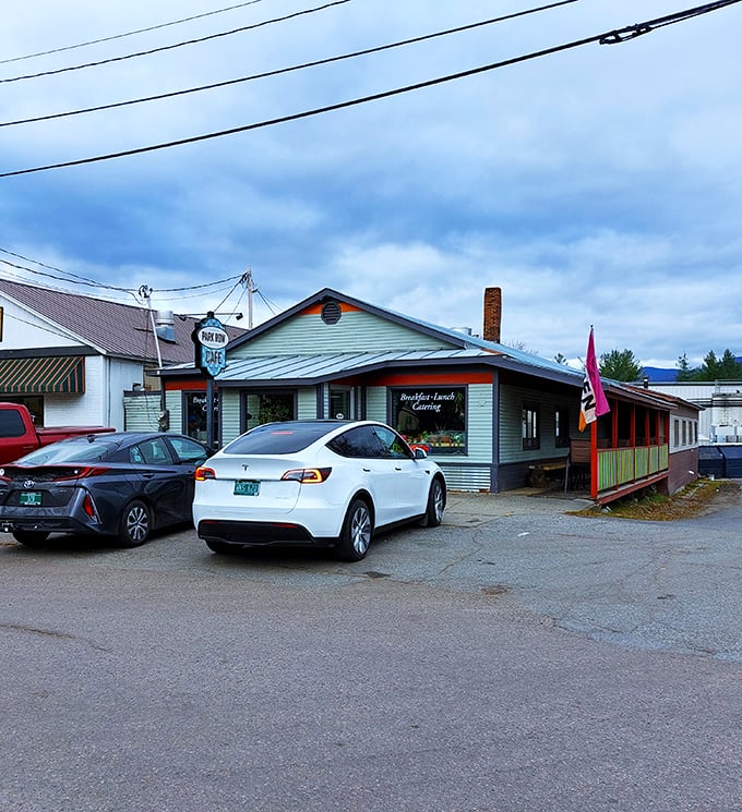 Park Row Cafe: Where cars come to dream about being filled with pancakes instead of gas. A pit stop for hungry humans and their vehicles.