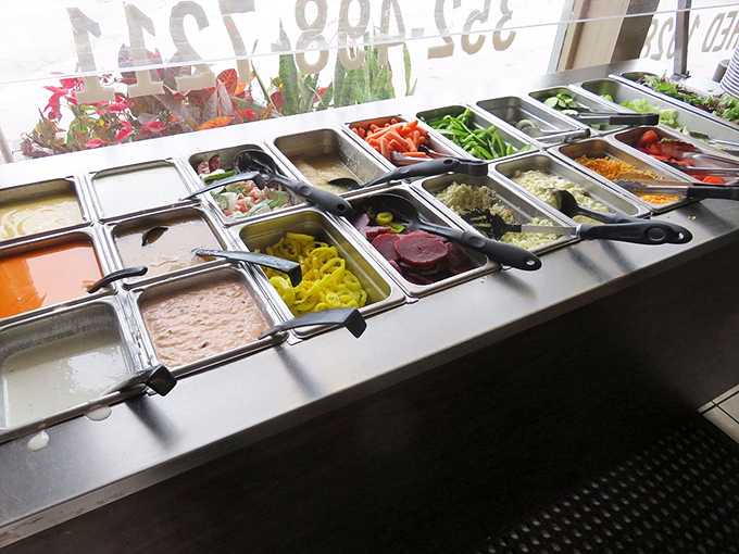 A rainbow of flavors awaits! This salad bar is so fresh and colorful, it could make even the most devoted carnivore consider going green.