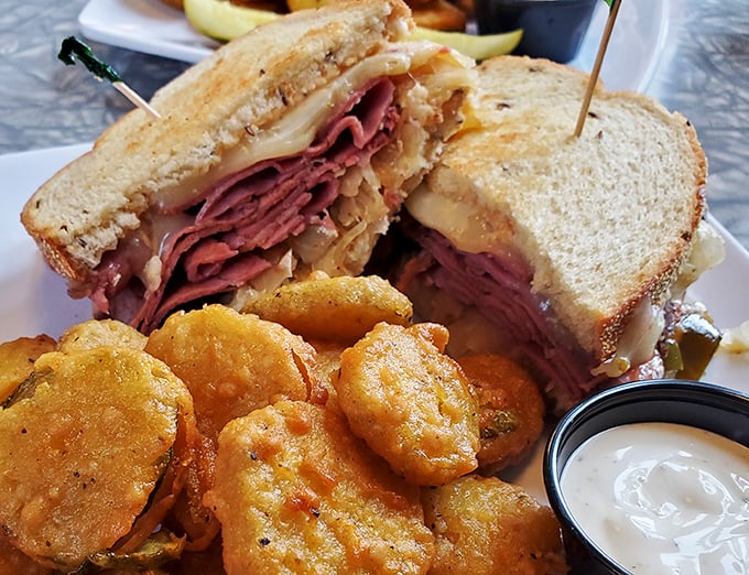 Now that's a sandwich! Stacked higher than a '57 Chevy on hydraulics, this beauty is a towering testament to the art of lunch.