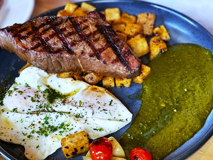 Surf and turf's breakfast cousin: This plate is like a morning rodeo for your mouth, with steak as the main event.