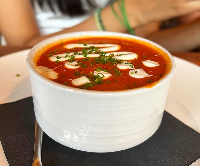 Tomato soup that's had a glow-up. Creamy, dreamy, and dotted with dollops of pure joy. Photo credit: Iron Shine