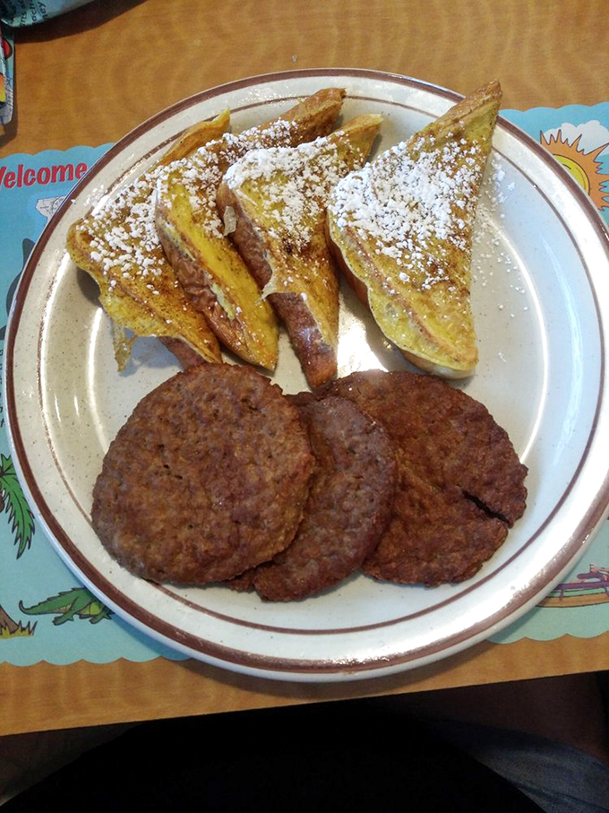 French toast that's dressed to impress! Paired with sausage patties, it's a breakfast duet that'll have you humming with happiness all day long. Photo credit: Jenn M.