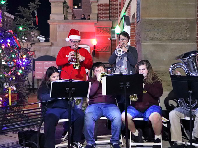 O come all ye music lovers! Athens' Christmas carolers prove that holiday spirit is best served with a side of brass.