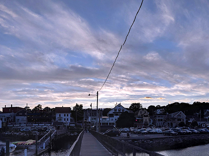 As the sun bids adieu, Boothbay Harbor transforms into a watercolor masterpiece. It's the kind of view that makes you want to cancel your flight home.