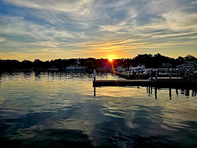 Mother Nature's grand finale! This harbor sunset is putting on a light show that would make even Vegas jealous.