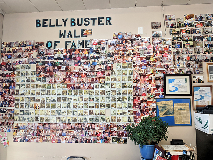 The "Belly Buster Wall of Fame" – where food challenges become legends and diets go to die. Glorious!