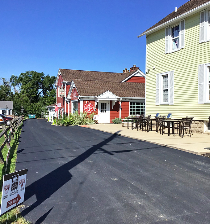 A slice of Americana, served with a side of apple pie. This quaint street scene is straight out of a Norman Rockwell painting.