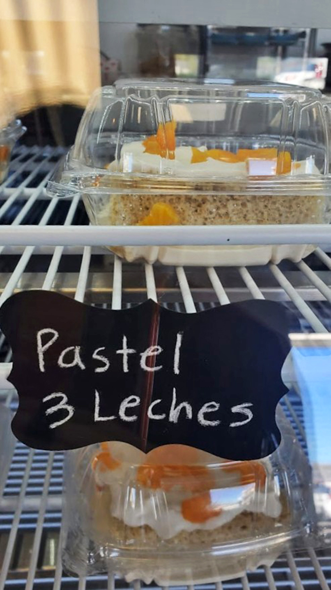 The humble chalkboard sign announces what might be the star of the show - their signature tres leches.