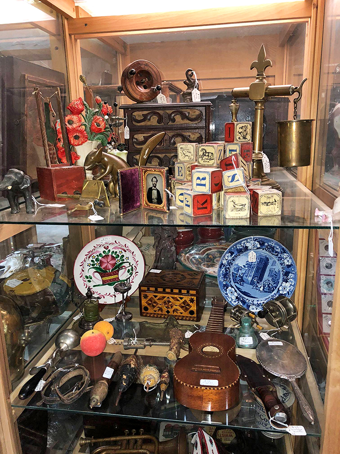 From antique instruments to vintage blocks, each item in this case represents a piece of American cultural history.