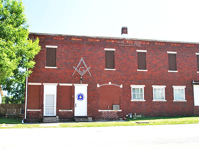 The Masonic Lodge stands proud, its brick facade and iconic symbol a reminder of Maquon's deep community ties.
