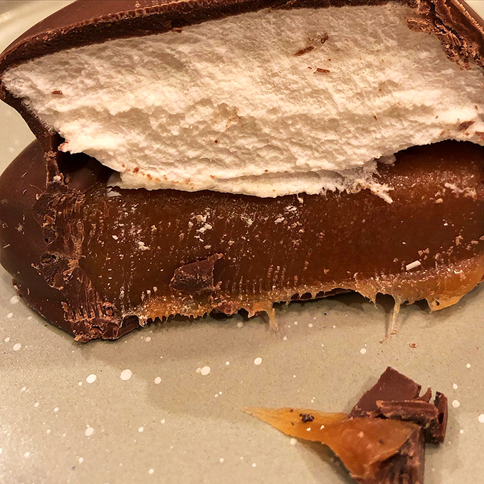 Chocolate, caramel, and marshmallow unite in perfect harmony. It's like a symphony in your mouth, conducted by sugar!