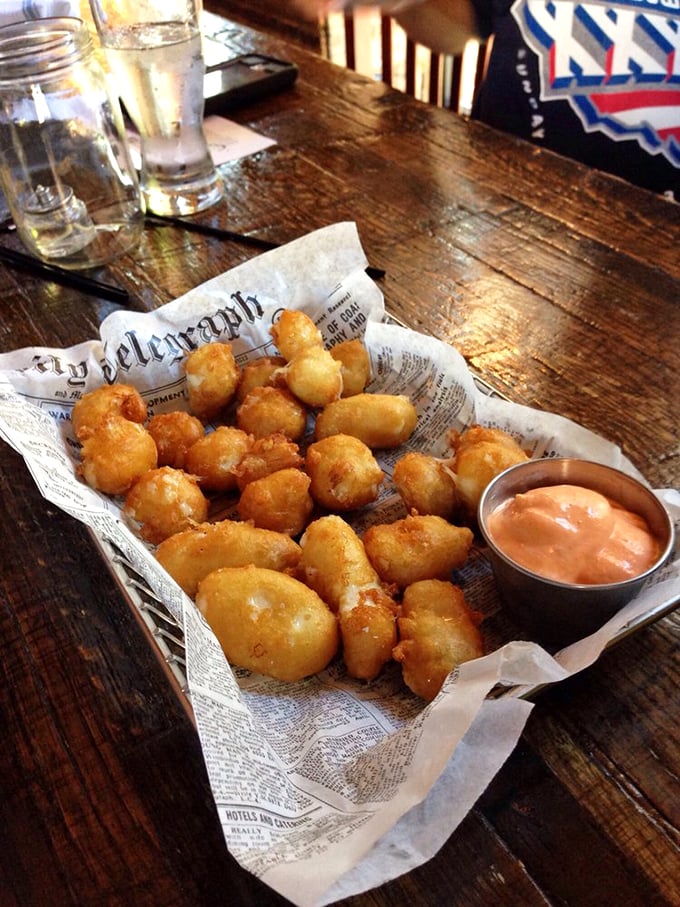 Cheese curds: Wisconsin's gift to the world. These golden nuggets of joy are like edible stress balls - squeeze 'em, eat 'em, repeat!