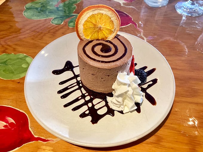 This chocolate mousse, crowned with a candied orange slice, is what dessert dreams are made of.