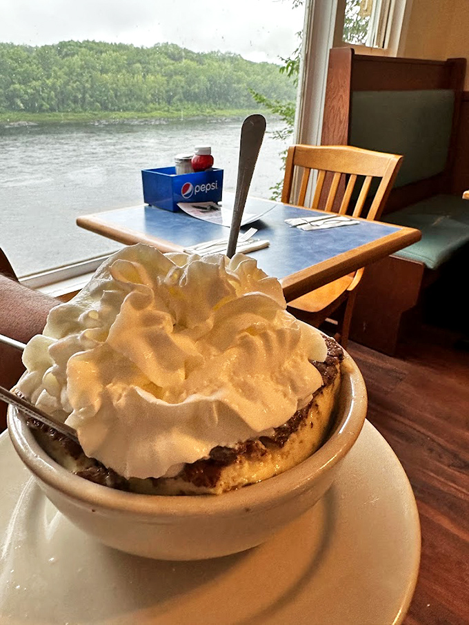 That whipped cream mountain on top of what appears to be dessert, with a bonus river view. Sweet endings!