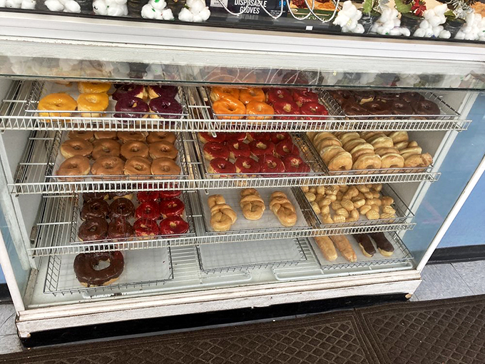 The glass case of temptation &ndash; where diet plans go to retire and joy comes in dozens.