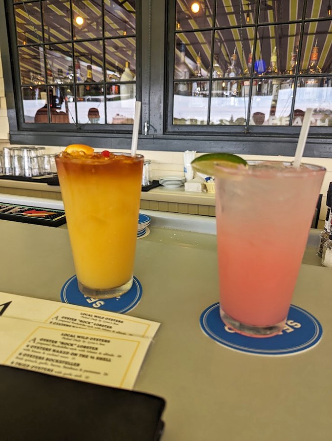 Colorful cocktails that capture the essence of summer, perfect for sipping while watching the harbor sunset.