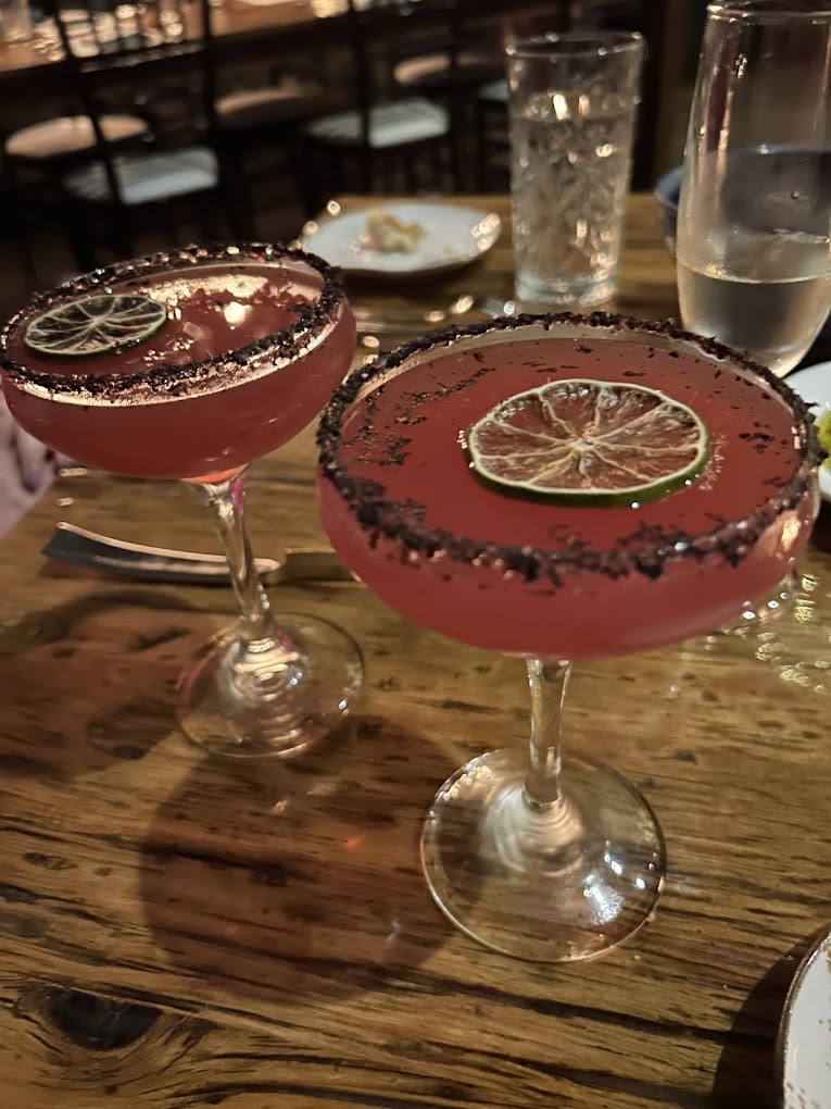 15Pink cocktails garnished with dried citrus wheels prove that sometimes the best art comes in liquid form. Photo credit: Taylor