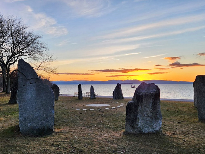 As day turns to dusk, the Earth Clock creates a magical silhouette against Vermont's colorful sunset sky.