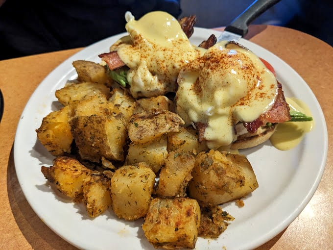 Eggs-cellence on a plate! This isn't just breakfast; it's a work of art. From the perfectly cooked eggs to the crispy bacon, it's a symphony of flavors that'll make your taste buds sing.