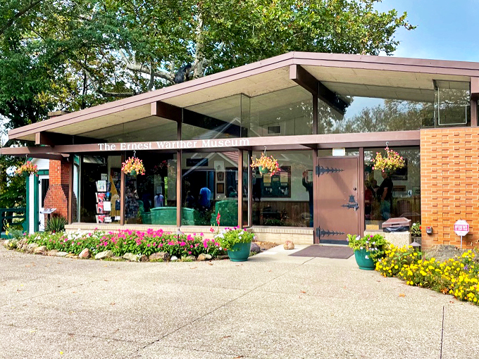 First impressions count! The Warther Museum's welcoming facade and blooming gardens promise a day filled with wooden wonders and floral delights.