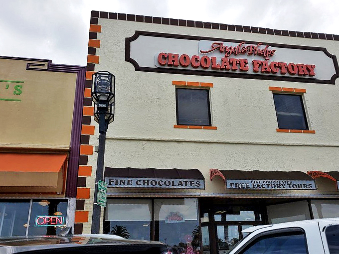 Exterior Close Up Fine chocolates and free tours? Now that's a sweet deal! This facade promises a world of cocoa wonders waiting just inside.