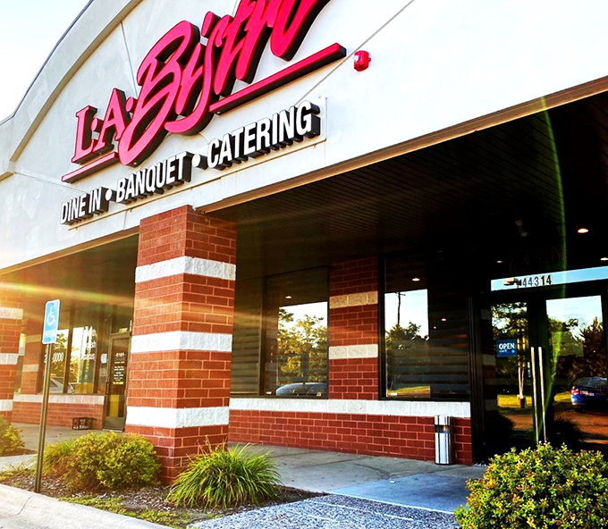 The evening light catches L.A. Bistro's signature signage, beckoning dinner guests like a culinary lighthouse.