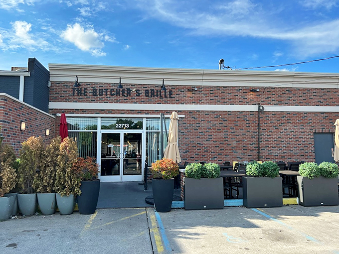 Where modern meets traditional: planters full of greenery soften the industrial edge of this Dearborn dining destination.