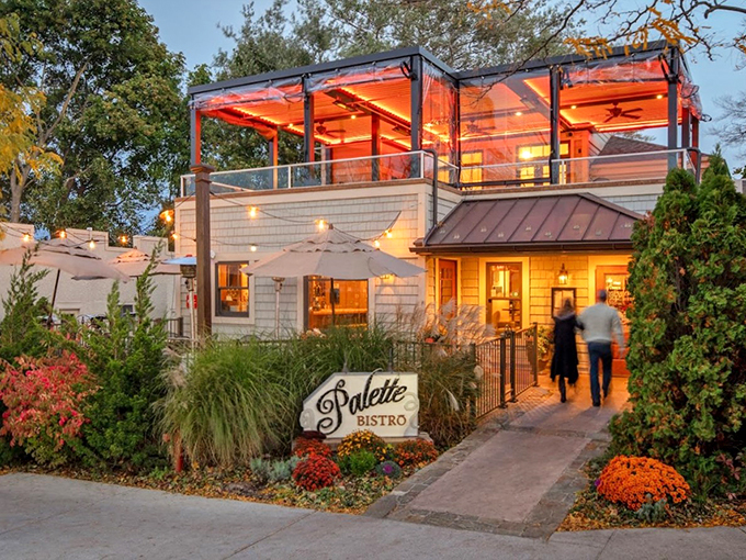 The glass-enclosed rooftop adds a modern crown to this coastal charmer, especially magical as twilight approaches.