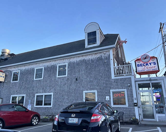 Weather-worn shingles and warm windows - this is what a real Maine diner looks like when it grows up.