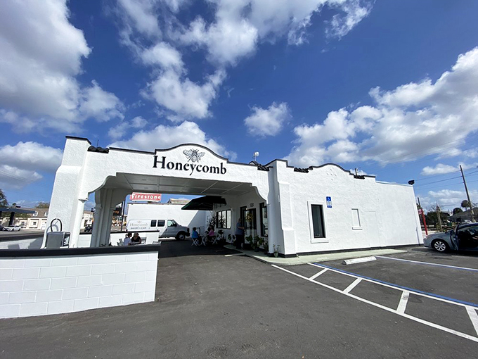 The classic white architecture stands like a beacon of hope for those seeking their morning bread fix.