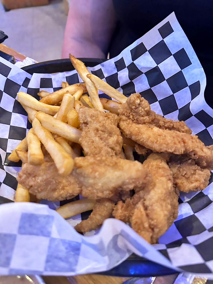 Crispy, golden fish and perfectly cooked fries - the kind of meal that makes you want to hug the chef.