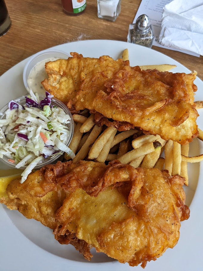 Fish and chips that would make a British pub jealous, with a golden batter that stays crispy till the last bite.