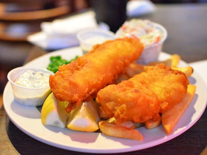 Golden, crispy, and utterly irresistible. These fish and chips could make a seagull consider moving to the desert.