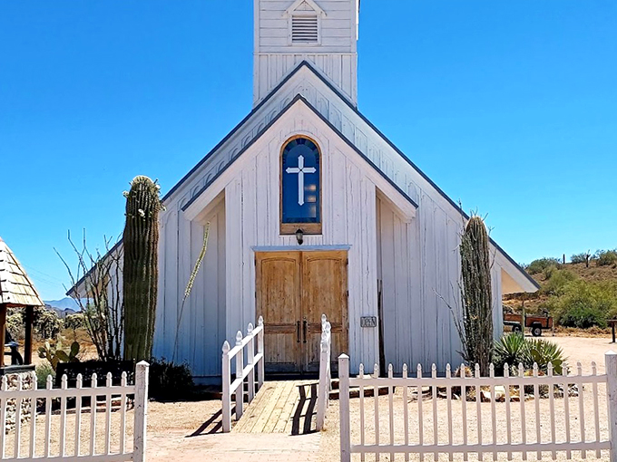 A picture-perfect white chapel, complete with saguaro sentries, welcomes visitors to this unique slice of Arizona history.
