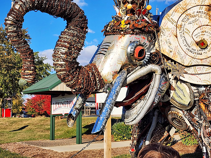 That knowing look in its mechanical eye seems to say, "Yes, I'm made of scrap metal. Isn't it wonderful?"