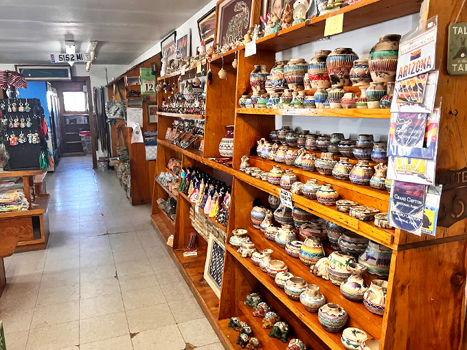 Colorful jars of desert delicacies line wooden shelves, promising flavors as bold as the landscape outside.