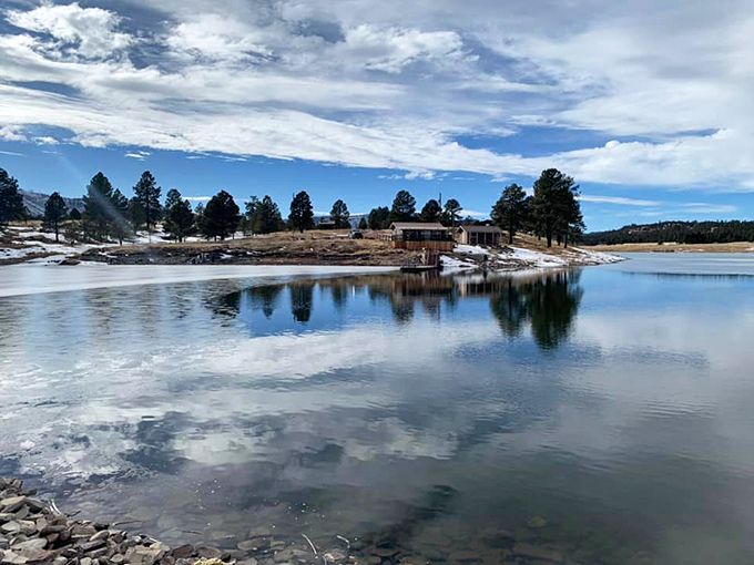 Mirror, mirror on the lake: Luna Lake's glassy surface reflects Alpine's beauty, doubling the scenery and your reasons to visit.
