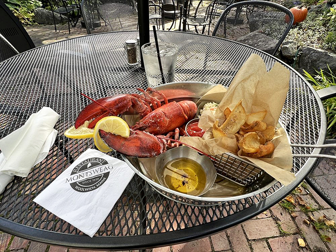 The ultimate Maine experience: fresh lobster on the patio, where every crack of the shell is a celebration.
