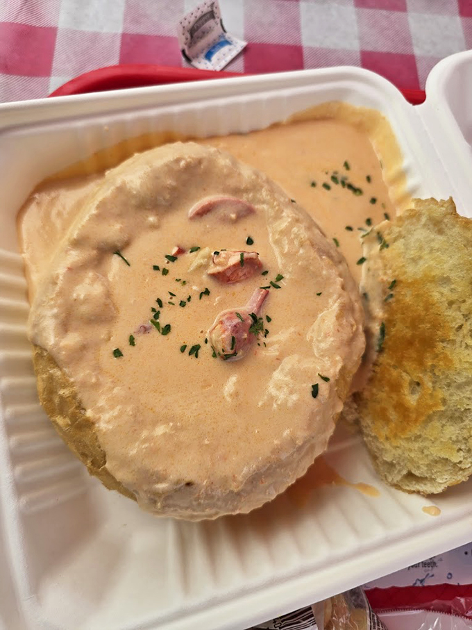 Lobster bisque wearing its finest pink party dress, garnished with fresh herbs and ready for its moment. Photo credit: Katie Reagan