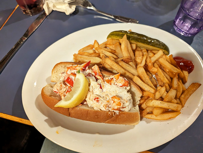 Another angle on perfection: chunks of fresh lobster meat in a classic roll, proving some traditions need no improvement.