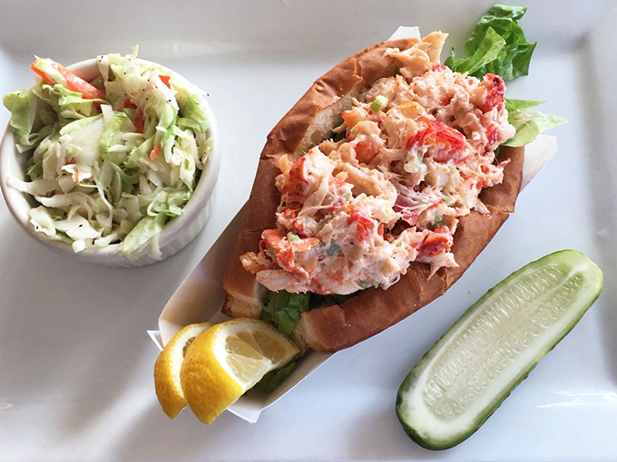 The ultimate lobster roll served with classic coleslaw - simple, perfect, and worth every penny. Photo credit: Donna M.