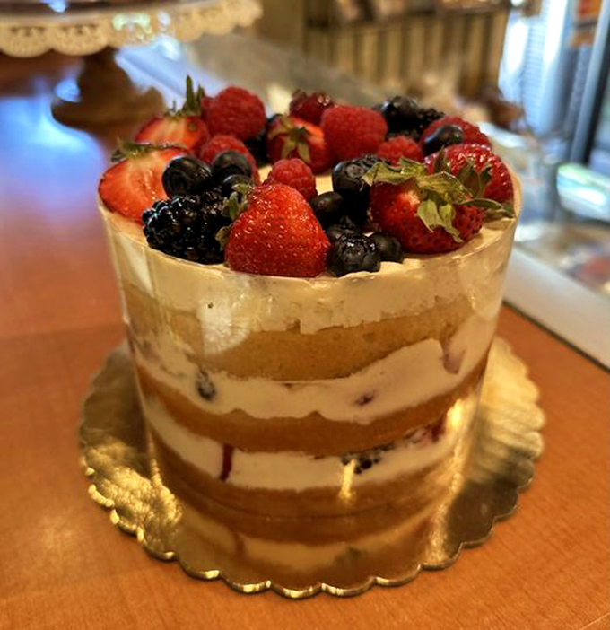 Summer in cake form! This berry-topped beauty is so fresh and vibrant, it might just break out into a rendition of "Here Comes the Sun."