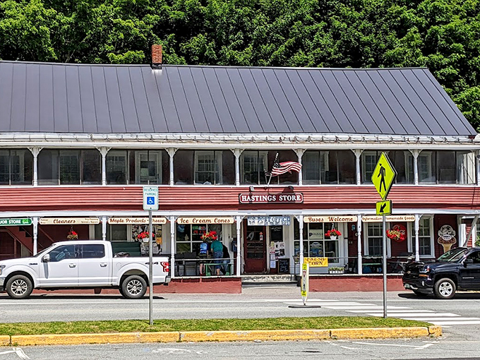 Hastings Store, with its classic Victorian porch, serves as the town's living room where maple syrup meets local gossip.