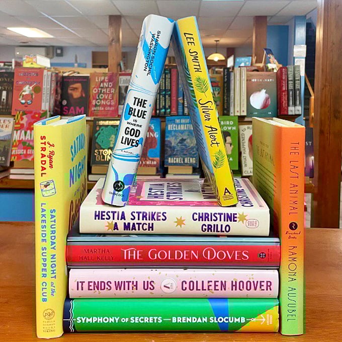 Fresh ink alert! This tower of new releases is like a literary Jenga game &ndash; carefully curated and just waiting for you to make your move.