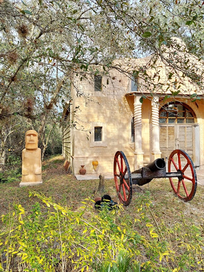 This whimsical vignette, complete with cannon and sculptures, shows that even castle grounds can have a sense of humor.