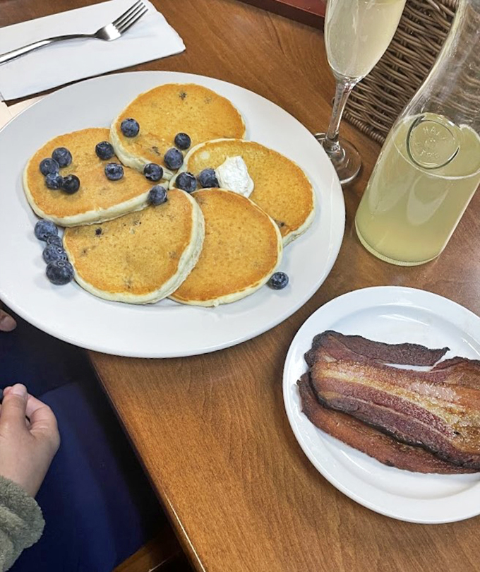 The breakfast of champions! These fluffy pancakes and crispy bacon are the dynamic duo your taste buds have been waiting for.
