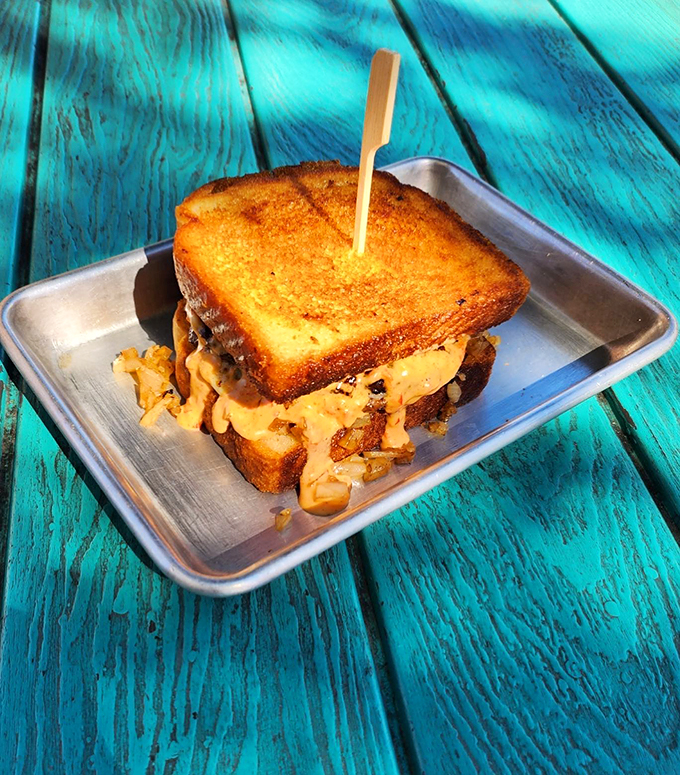 Meet the patty melt that'll melt your heart faster than a Vermont spring thaw. This sandwich is so perfectly grilled and gooey, it should come with its own theme song.