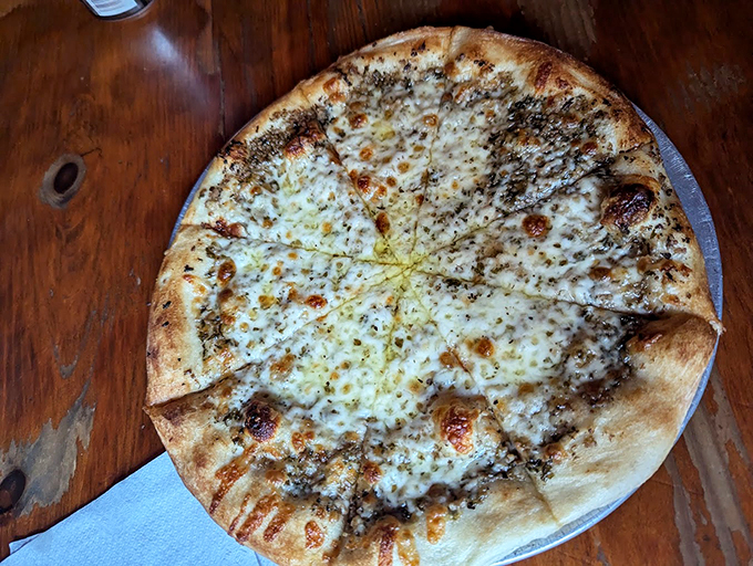 The white pizza that could convert even the most devoted red sauce fans. Those herbs mean business.