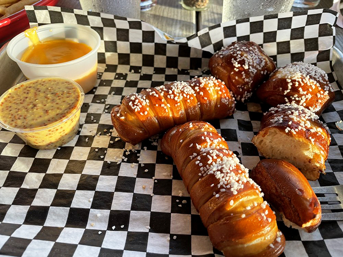 Warm, twisted perfection with a side of house-made mustard that'll make you rethink everything you knew about pretzels.